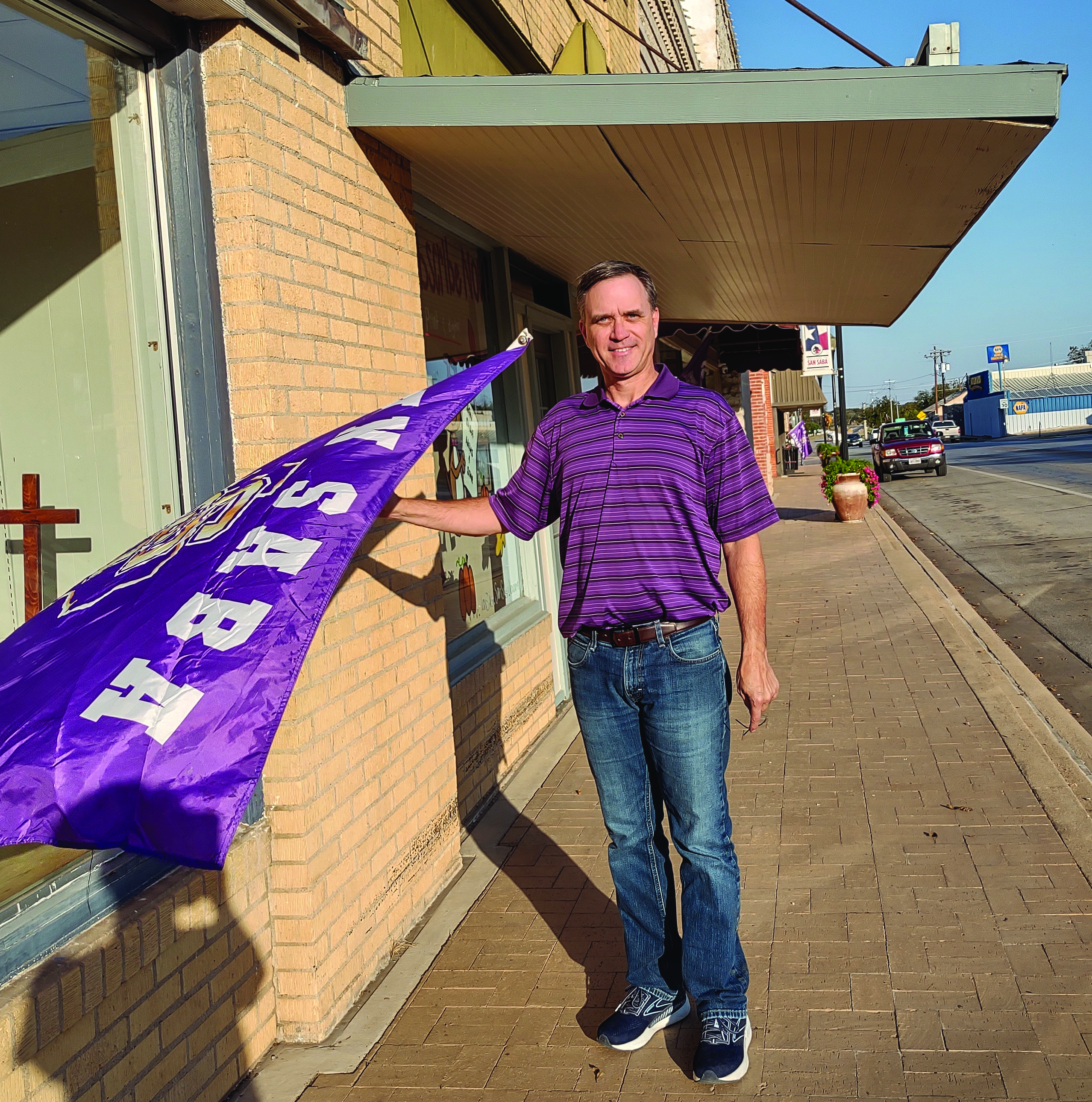 Ever see the flags flying on downtown businesses? How do they get there ...